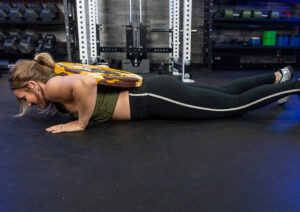 18 Trainer-Approved Weight Plate Exercises | Garage Gym Reviews