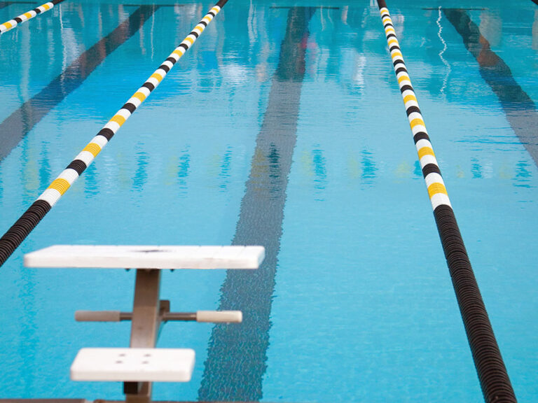 How Many Laps In a Pool Is a Good Workout? A CPT Answers | Garage Gym ...